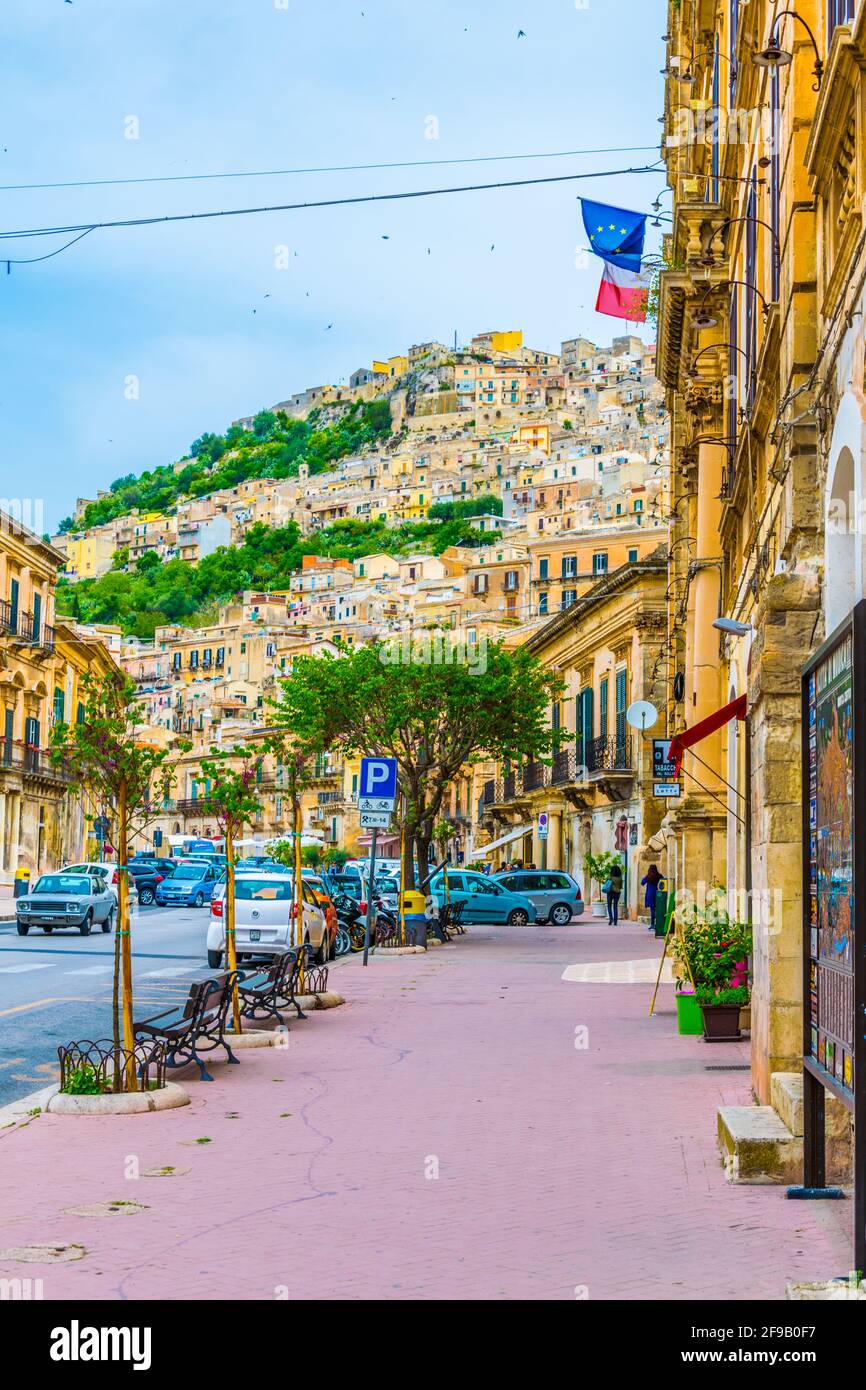 MODICA, ITALY, APRIL 26, 2017: View of a narrow street in Modica ...