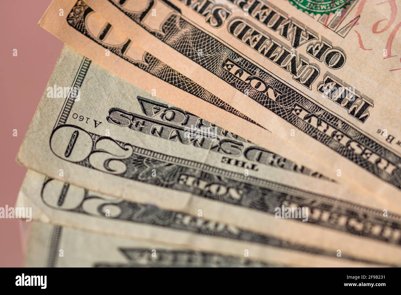 Selective focus on detail of USD banknotes. Counting or giving United ...