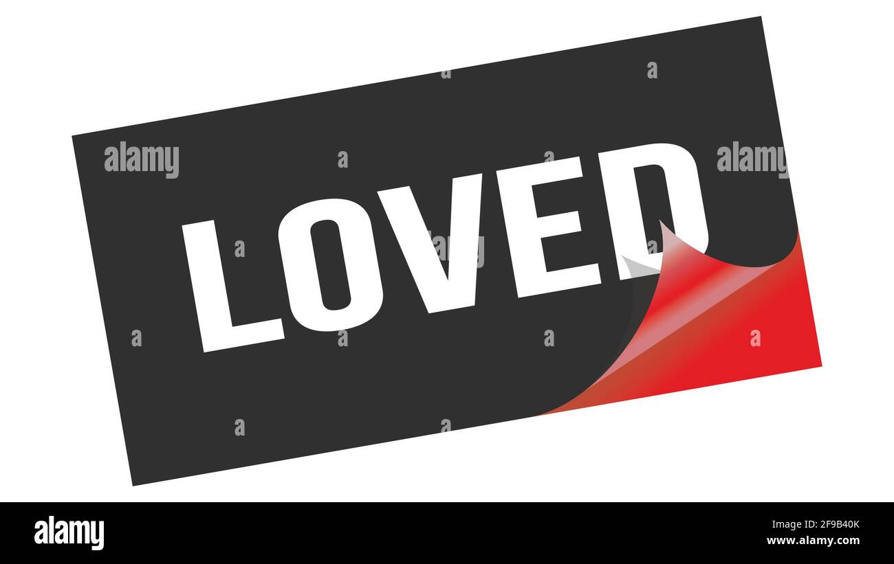 LOVED text written on black red sticker stamp Stock Photo - Alamy
