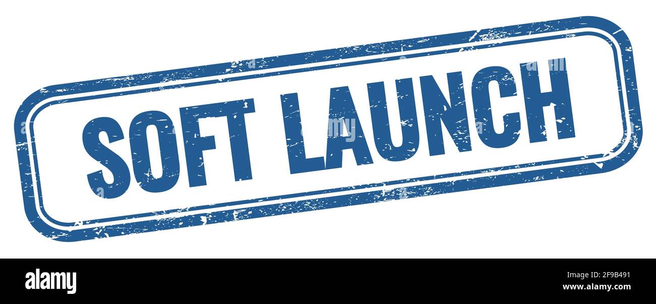 SOFT LAUNCH text on blue grungy vintage rectangle stamp Stock Photo - Alamy