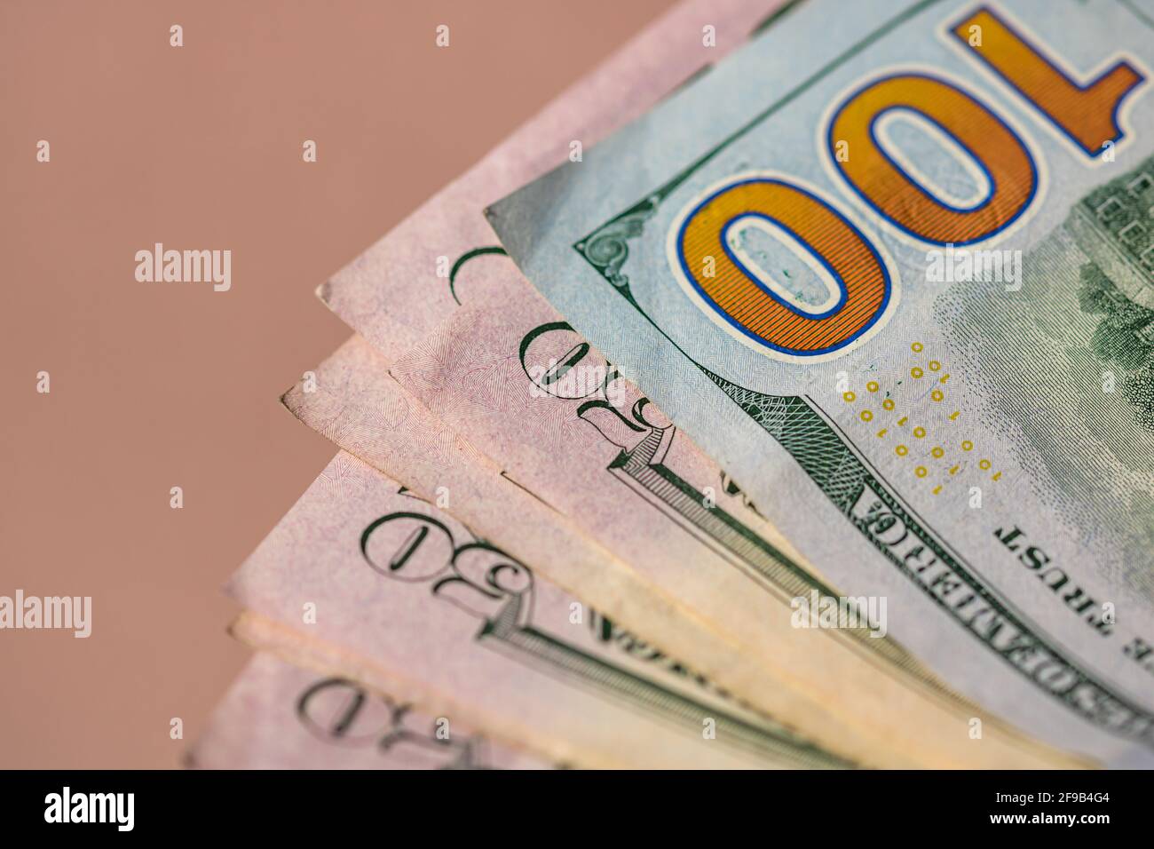 Selective focus on detail of USD banknotes. Counting or giving United ...