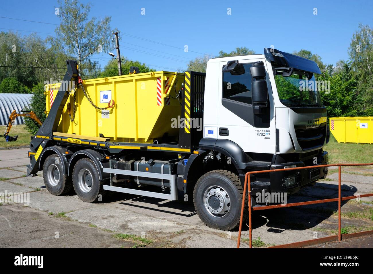 Radioactive waste storage container loading on a truck crane. October 1 ...