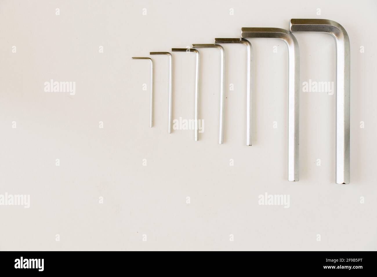 Closeup shot of different sizes of Allen wrenches isolated on white ...