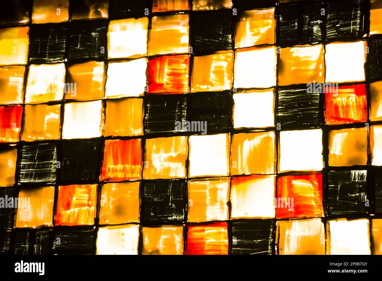 Closeup shot of red, orange, and yellow square patterns used as ...