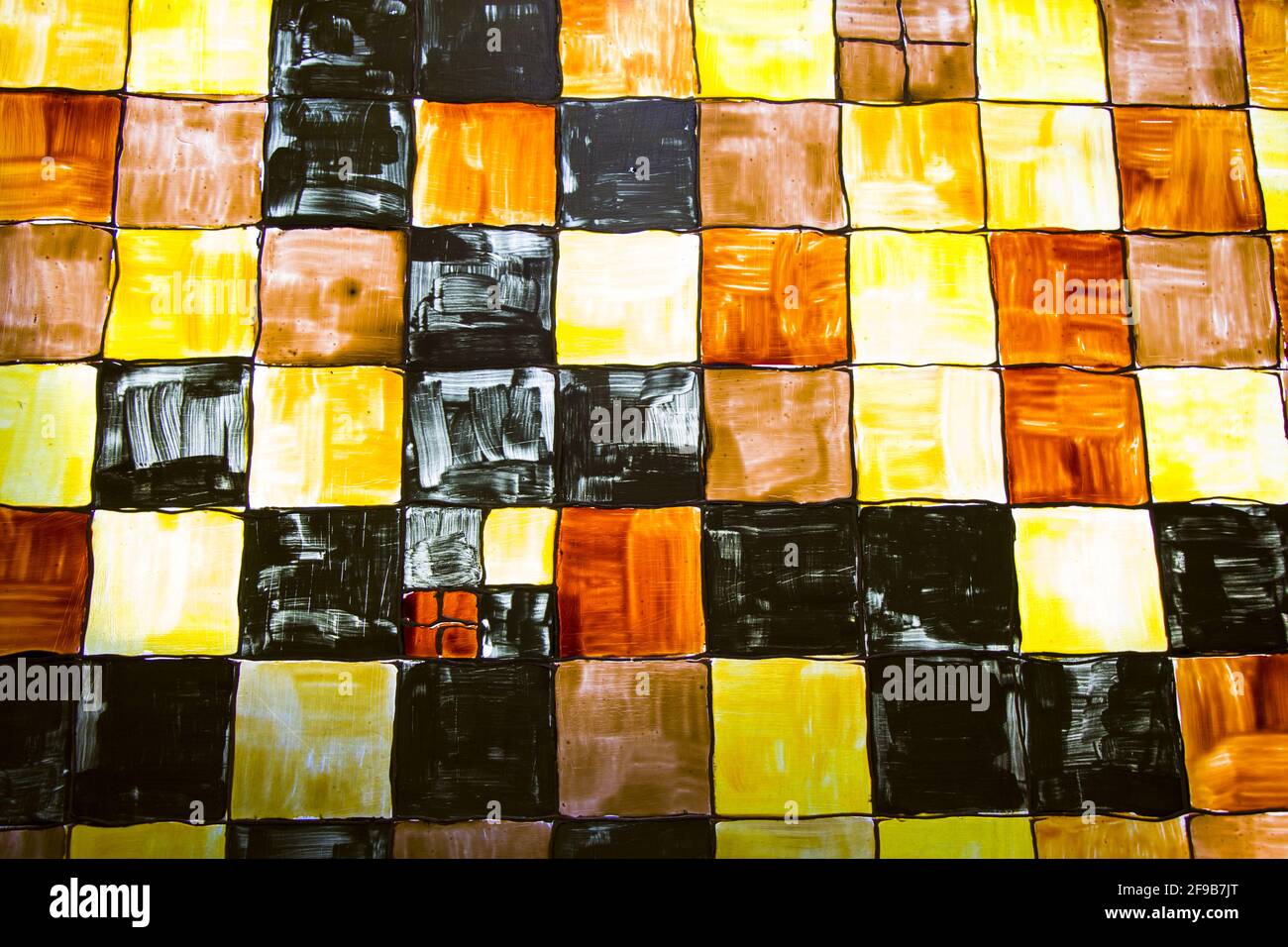 Abstract background design with orange and black tiles Stock Photo - Alamy