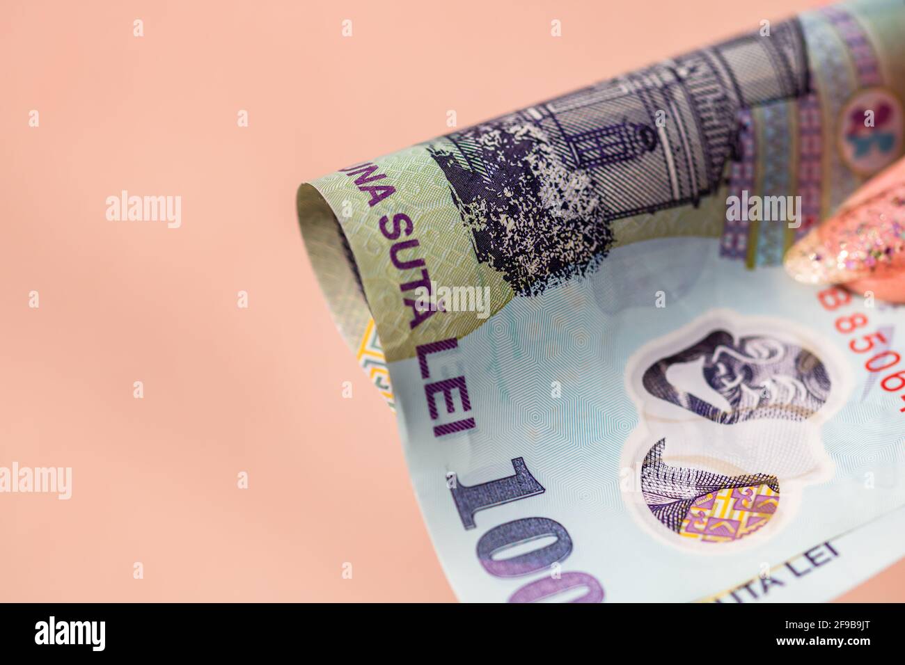Selective focus on detail of LEI banknotes. Counting or giving Romanian ...