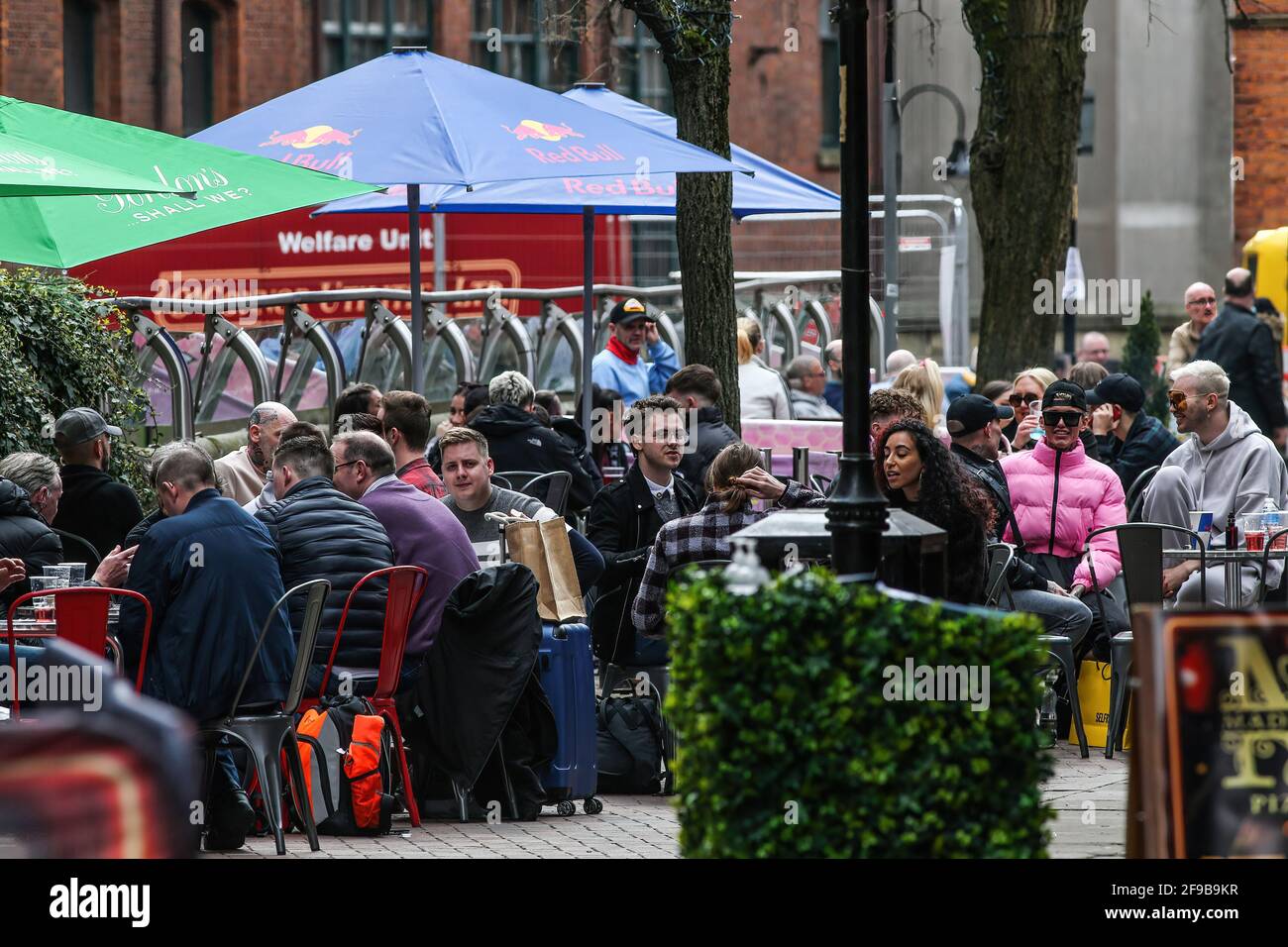 Manchester, UK. 16th Apr, 2021. People gather in the bars and pubs on ...