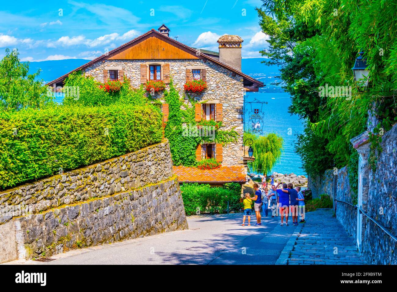 YVOIRE, France, JULY 21, 2017: People are strolling through medieval ...