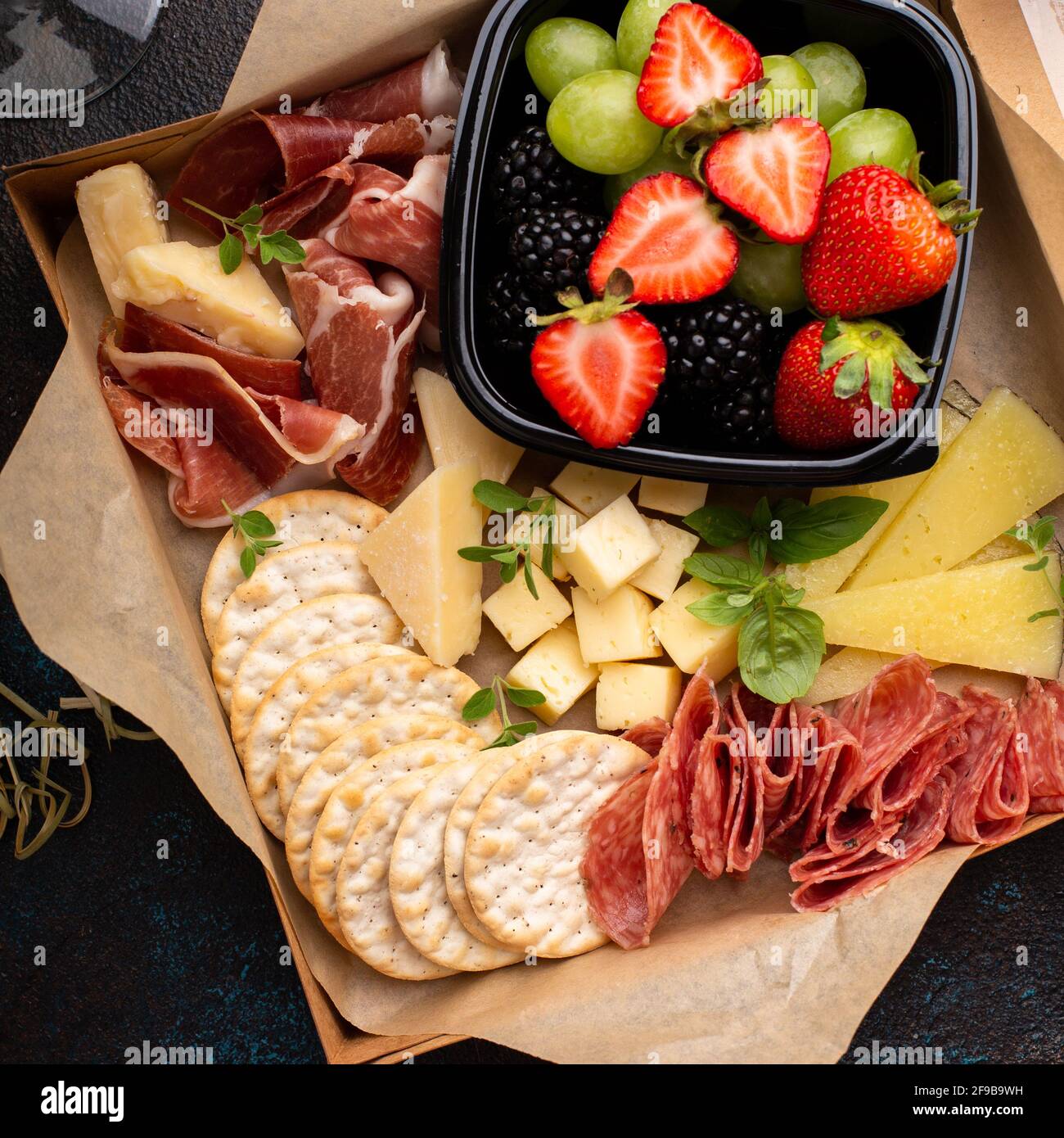 Cheese and meat assortment in a to go box Stock Photo - Alamy