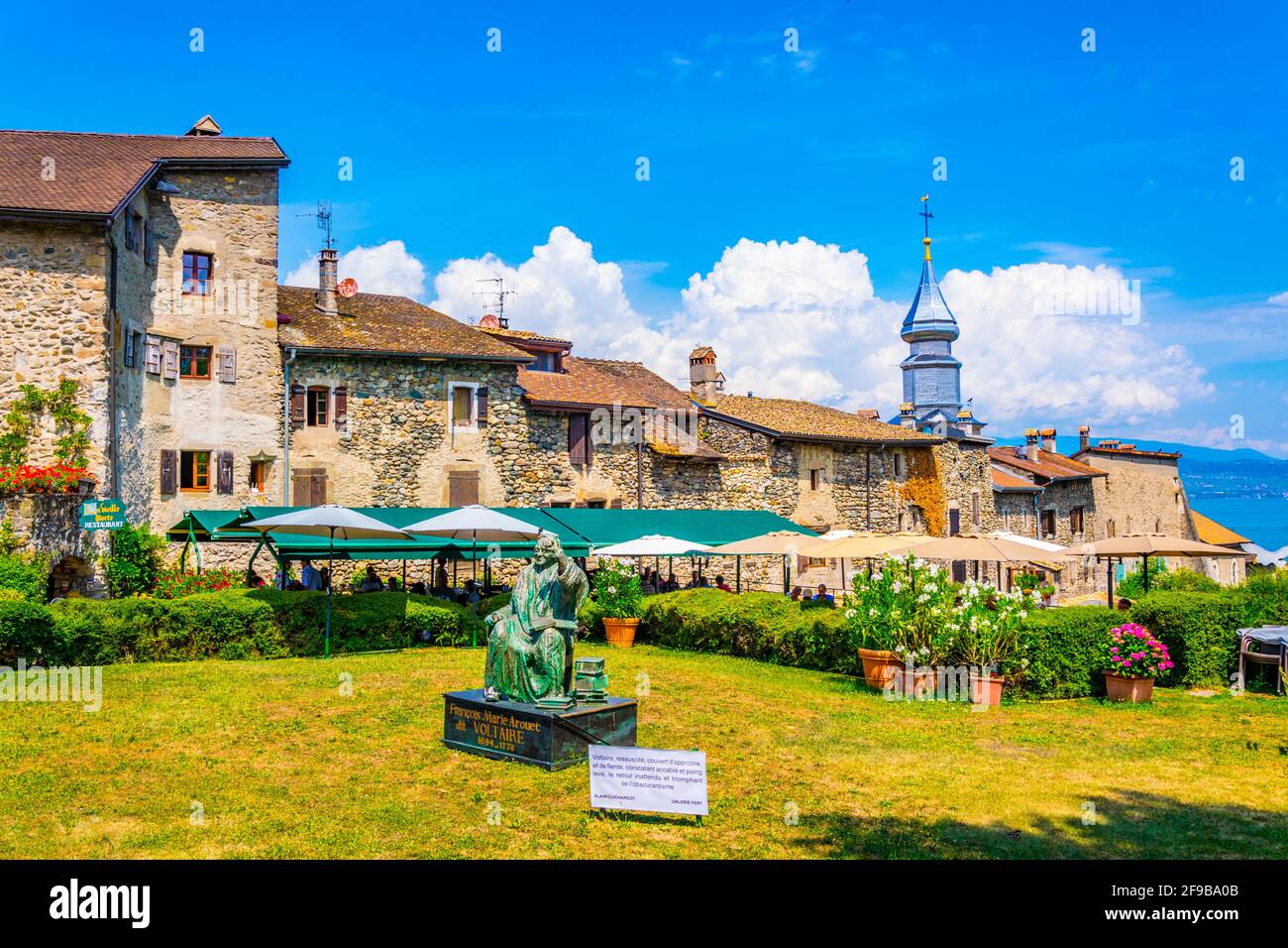 YVOIRE, France, JULY 21, 2017: Statue of Voltaire in French city Yvoire ...