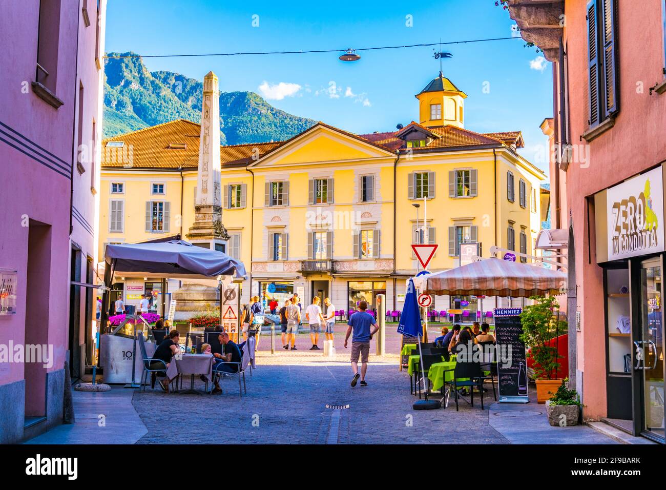 BELLINZONA, SWITZERLAND, JULY 26, 2017:Narrow street in the center of ...