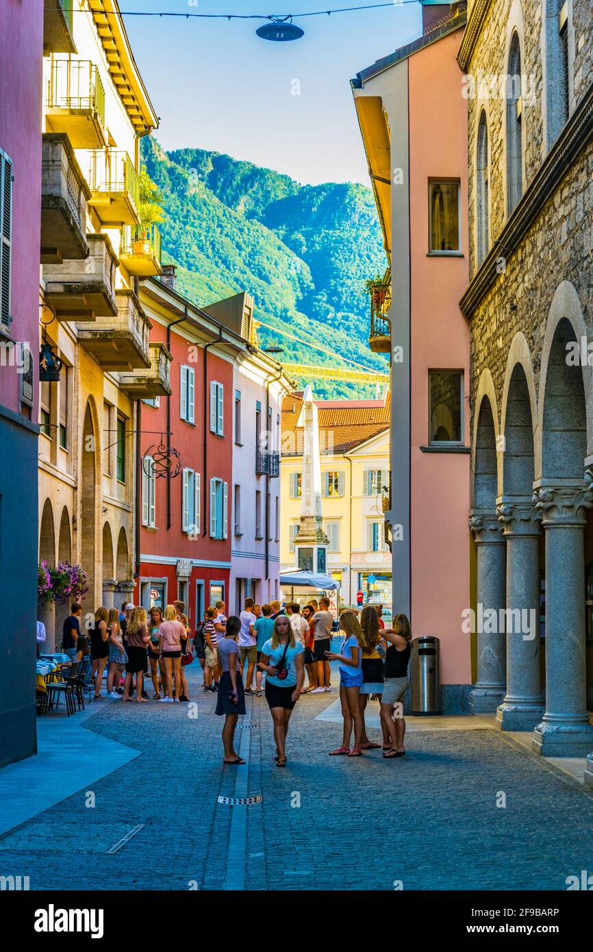 BELLINZONA, SWITZERLAND, JULY 26, 2017:Narrow street in the center of ...