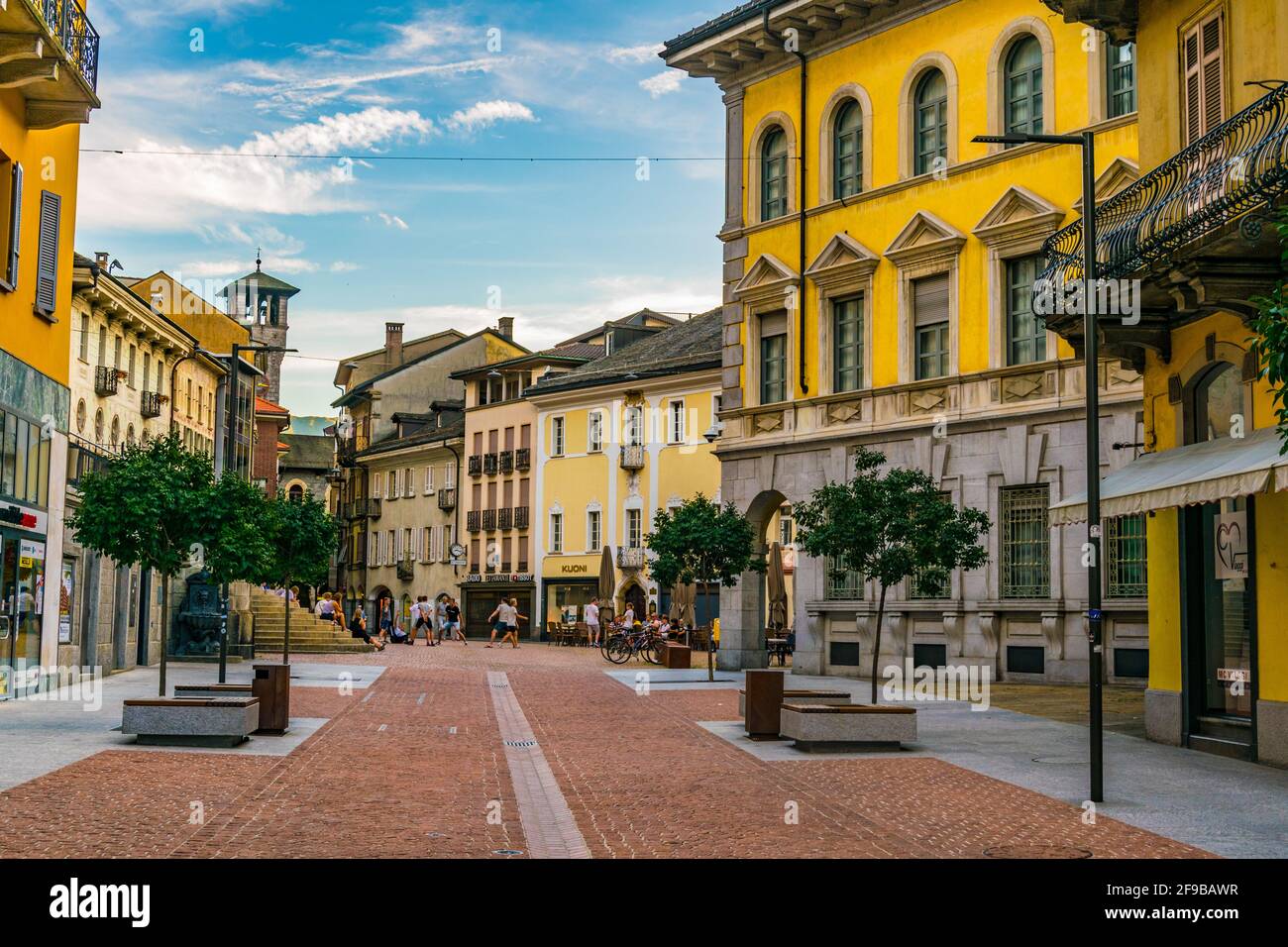 BELLINZONA, SWITZERLAND, JULY 26, 2017:Narrow street in the center of ...