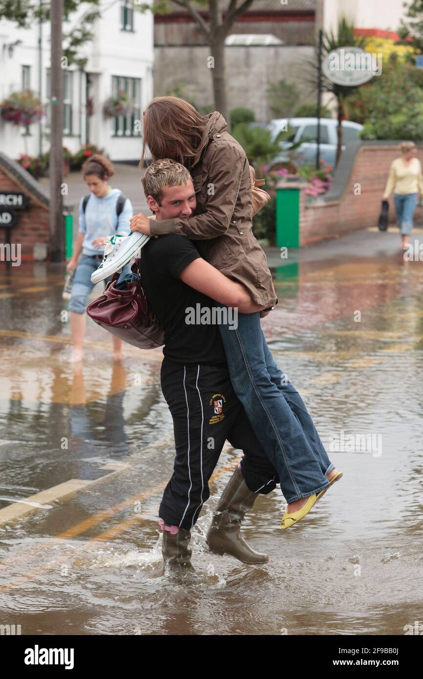 Man walking through flood water hi-res stock photography and images - Alamy