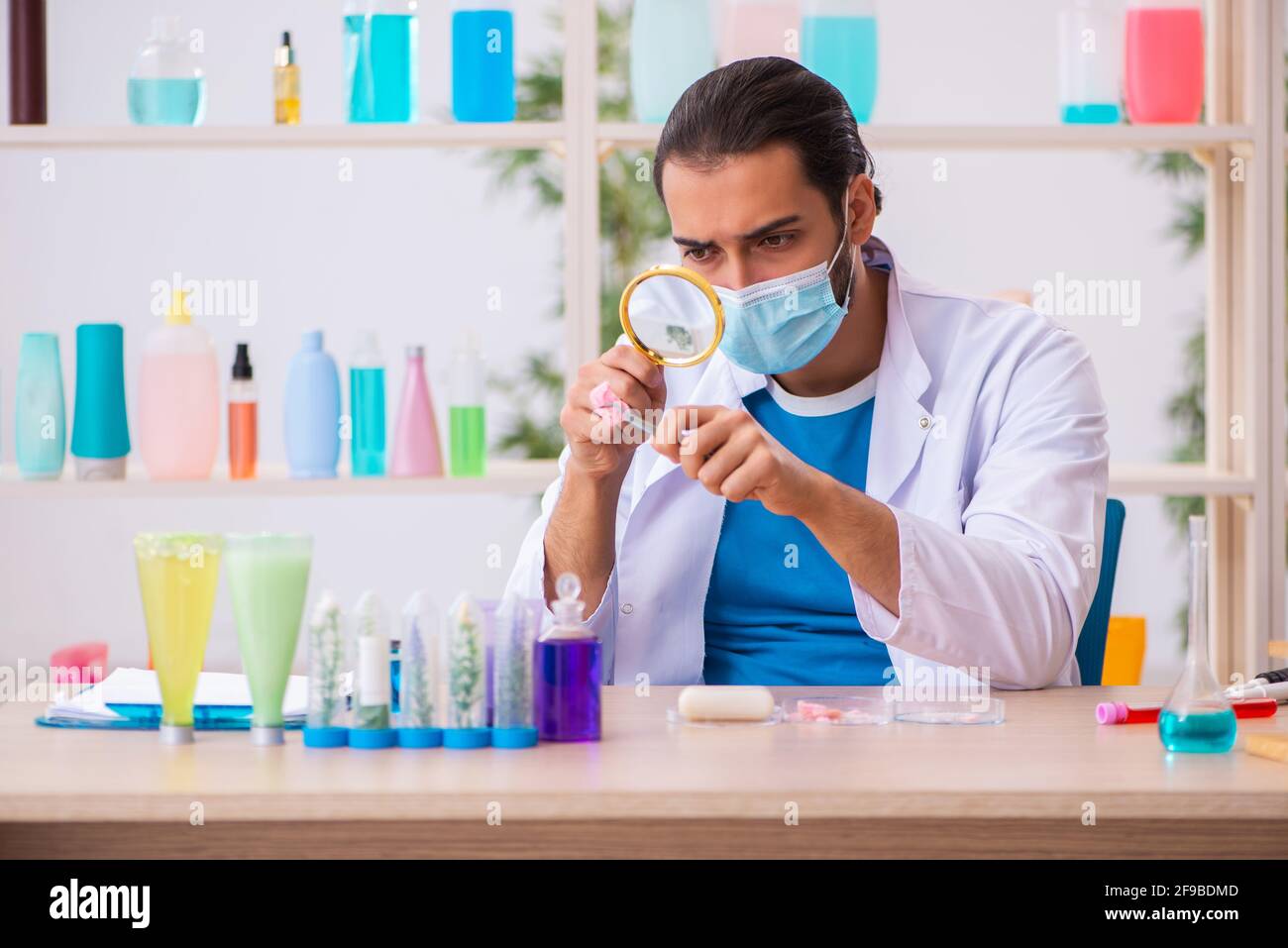 Young chemist testing soap in the lab Stock Photo - Alamy