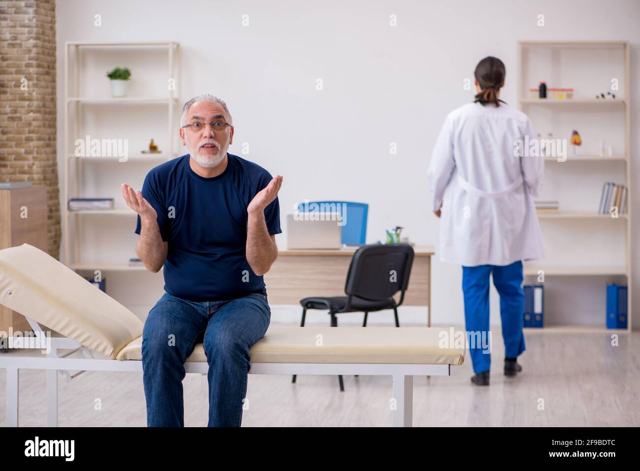 Old man waiting medical examination hi-res stock photography and images ...