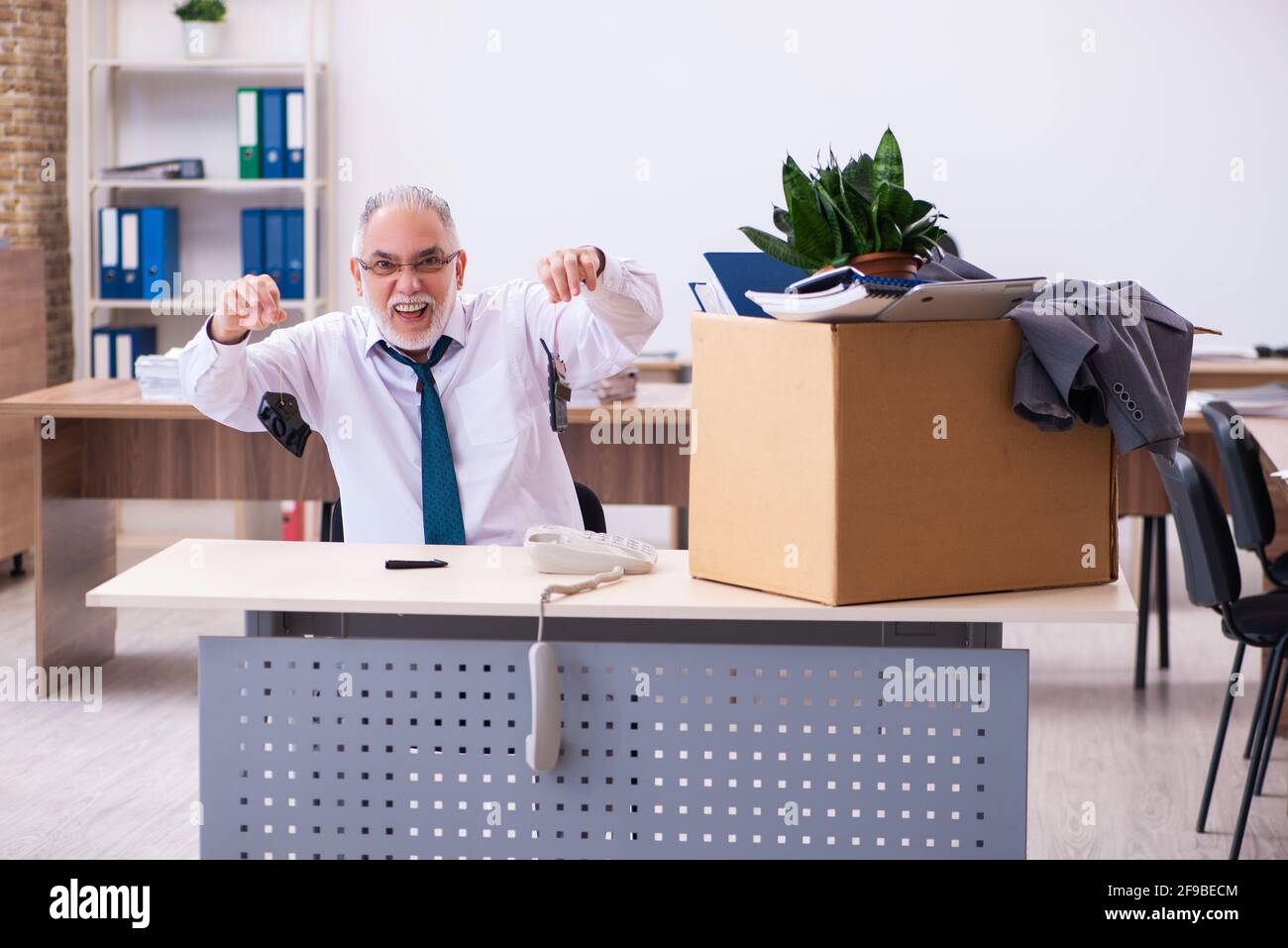 Old employee being fired from his work Stock Photo - Alamy