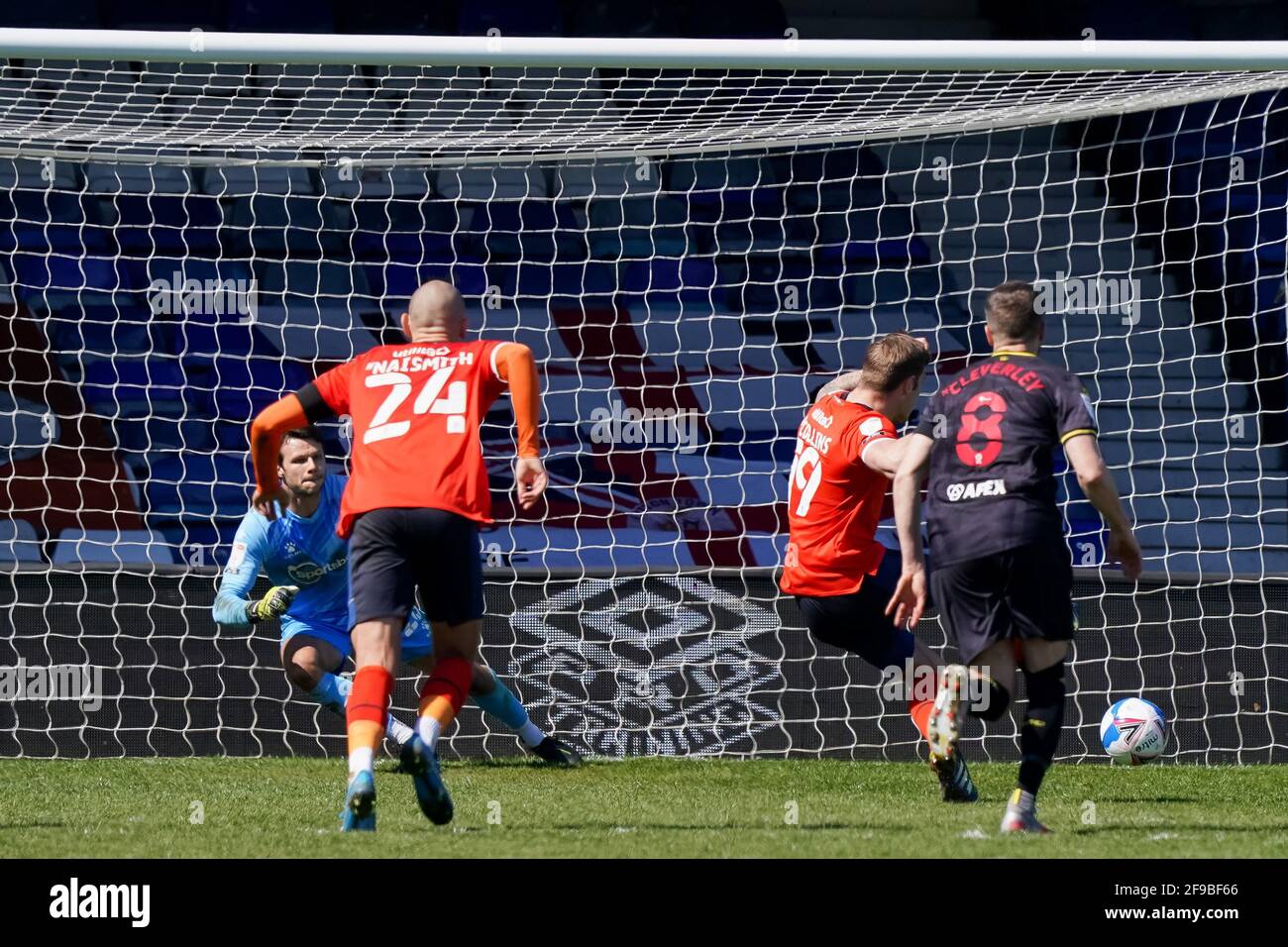 James Collins #19 of Luton Town scores from the penalty spot in Luton ...