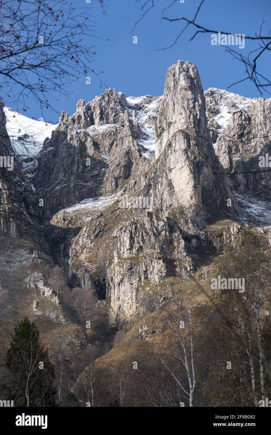 Vertical shot of Dolomites mountain ranges with snow in Italy Stock ...