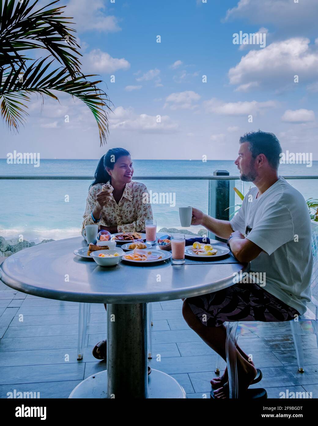 breakfast with a sea view at the beach. Aruba Stock Photo - Alamy