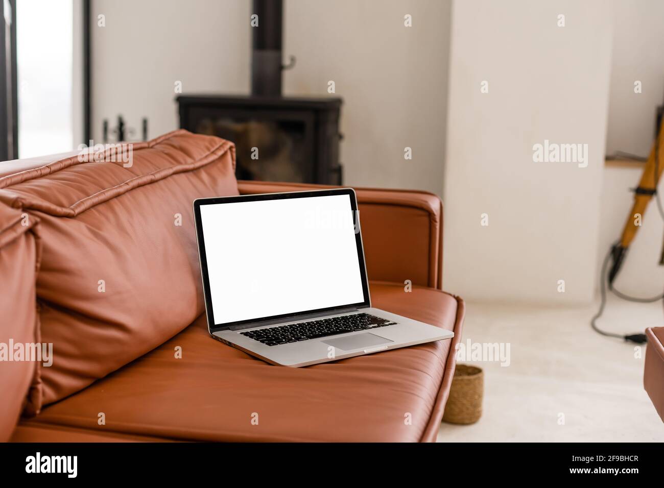 Blank screen laptop. Home office workspace. Modern nordic interior design template Stock Photo ...