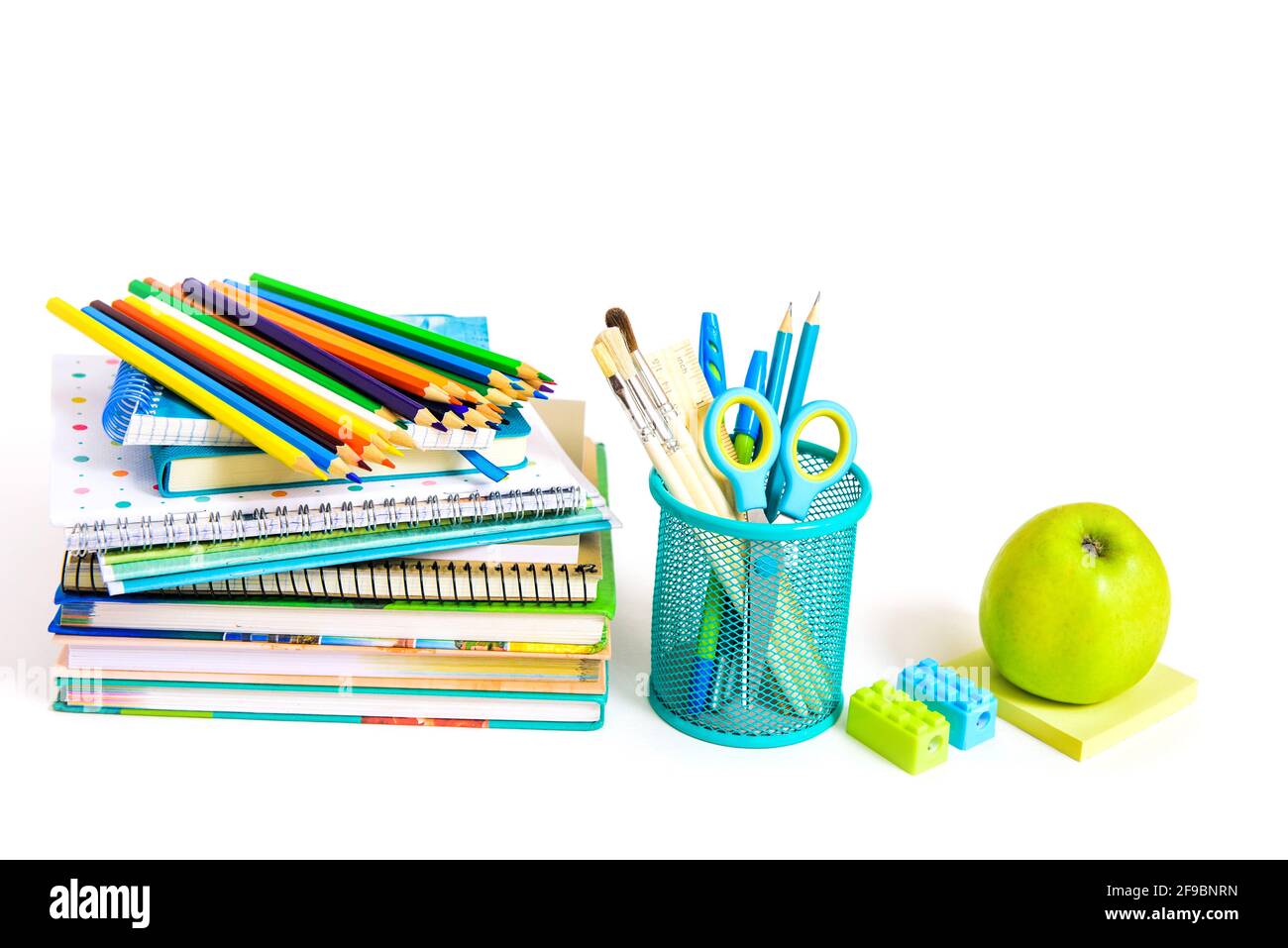 Back to school concept. Notebook stack and school pencils. Schoolchild ...