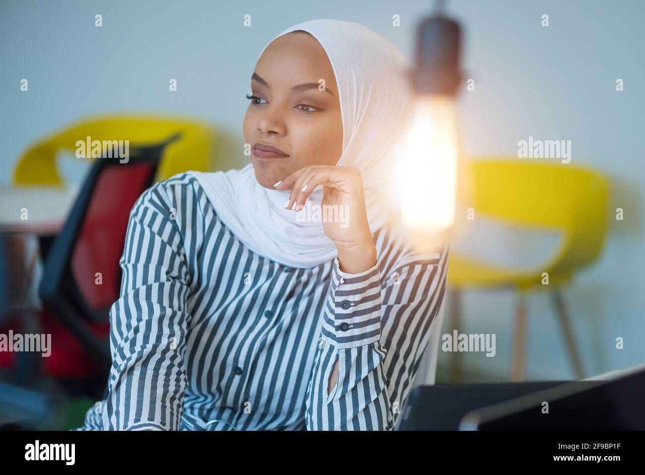 Young muslim African American business woman as a leader at work ...