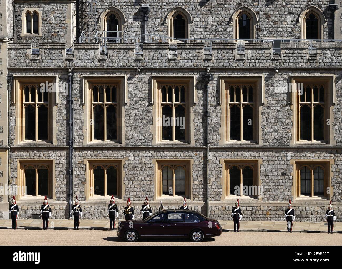 Queen Elizabeth II and Lady Susan Hussey drive through the Quadrangle ...