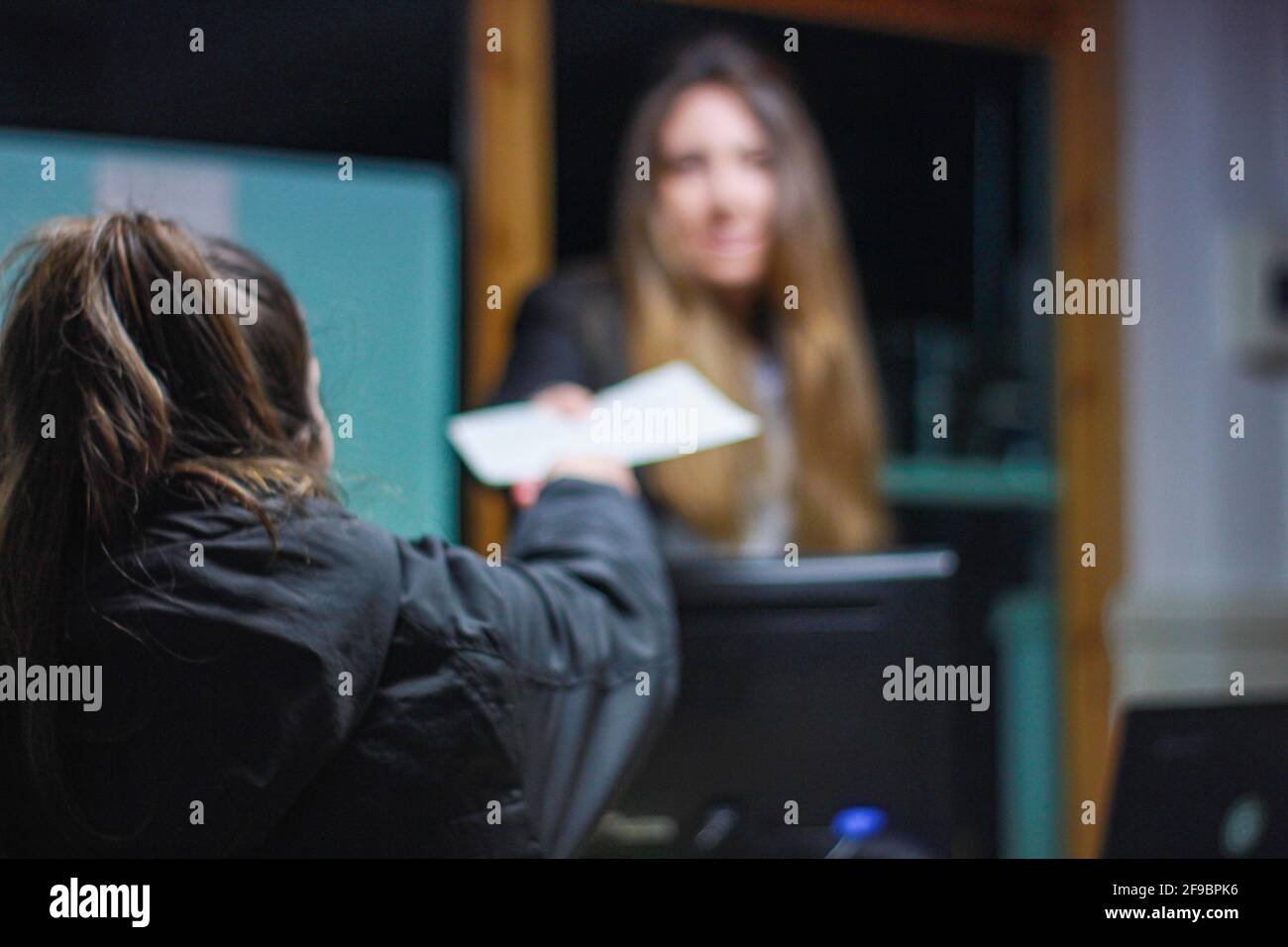 Female secretary giving business documents hi-res stock photography and ...