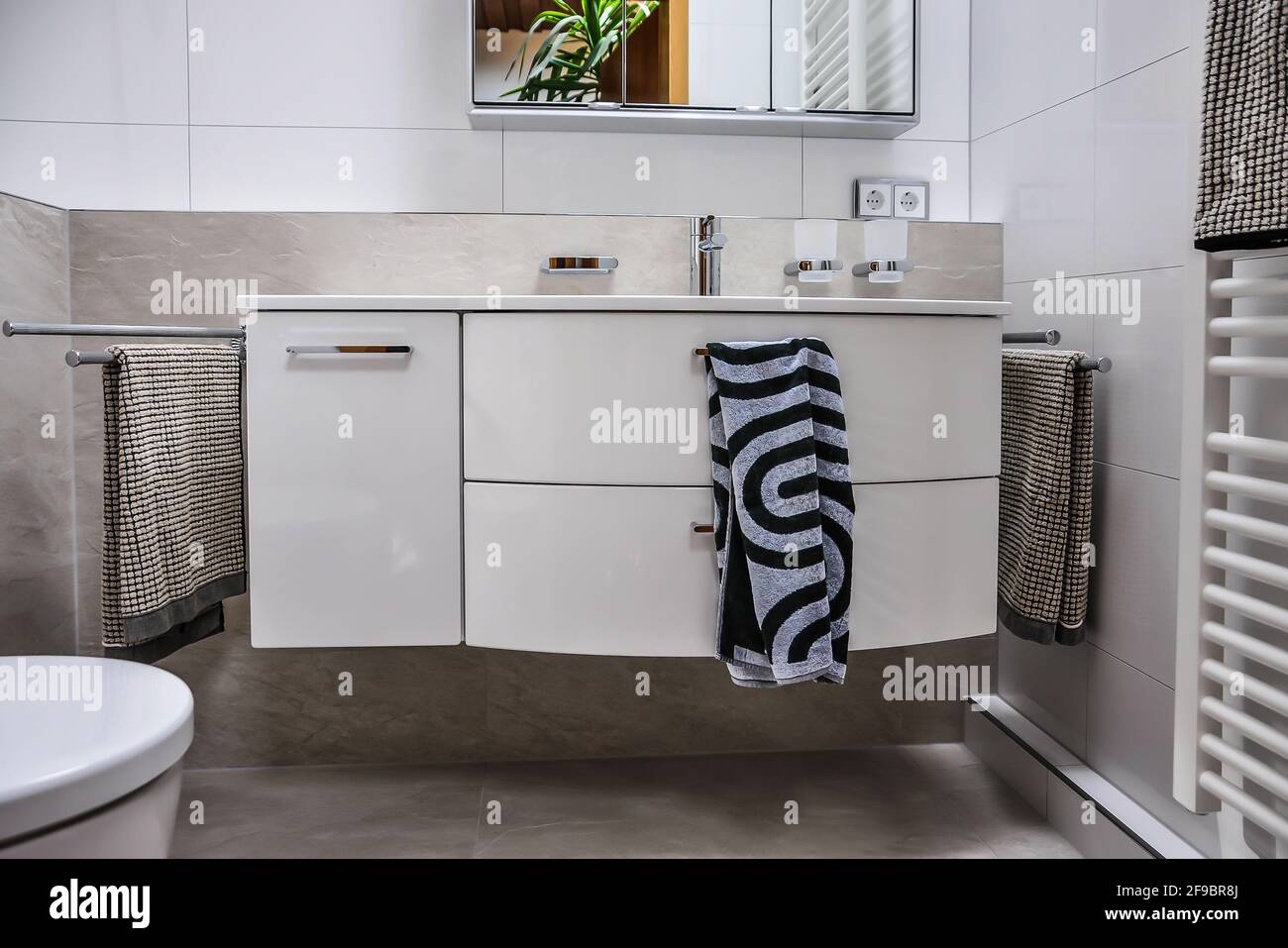 modern vanity unit with base unit and matching accessories. The colors ...