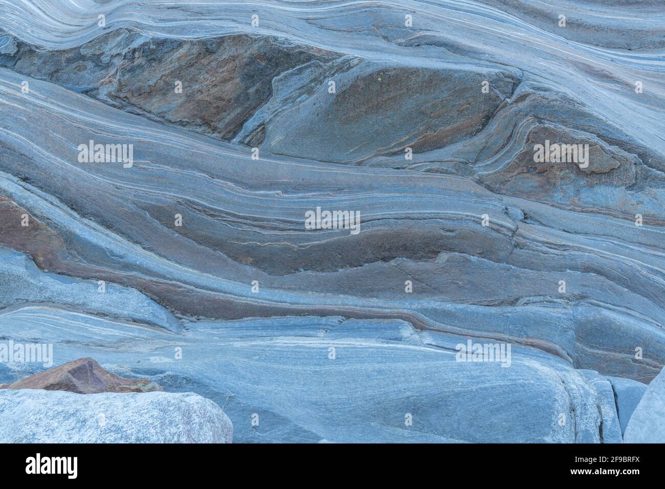 Beautiful view of black and blue Old stone wall texture background made ...