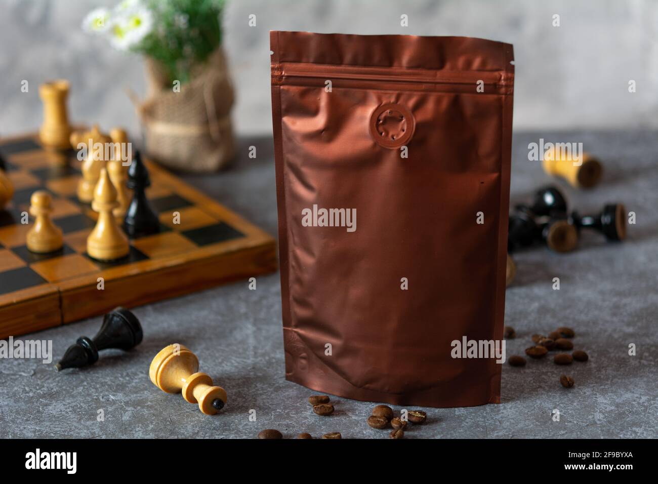Blank coffee packaging with degassing valve, coffee beans and chess ...