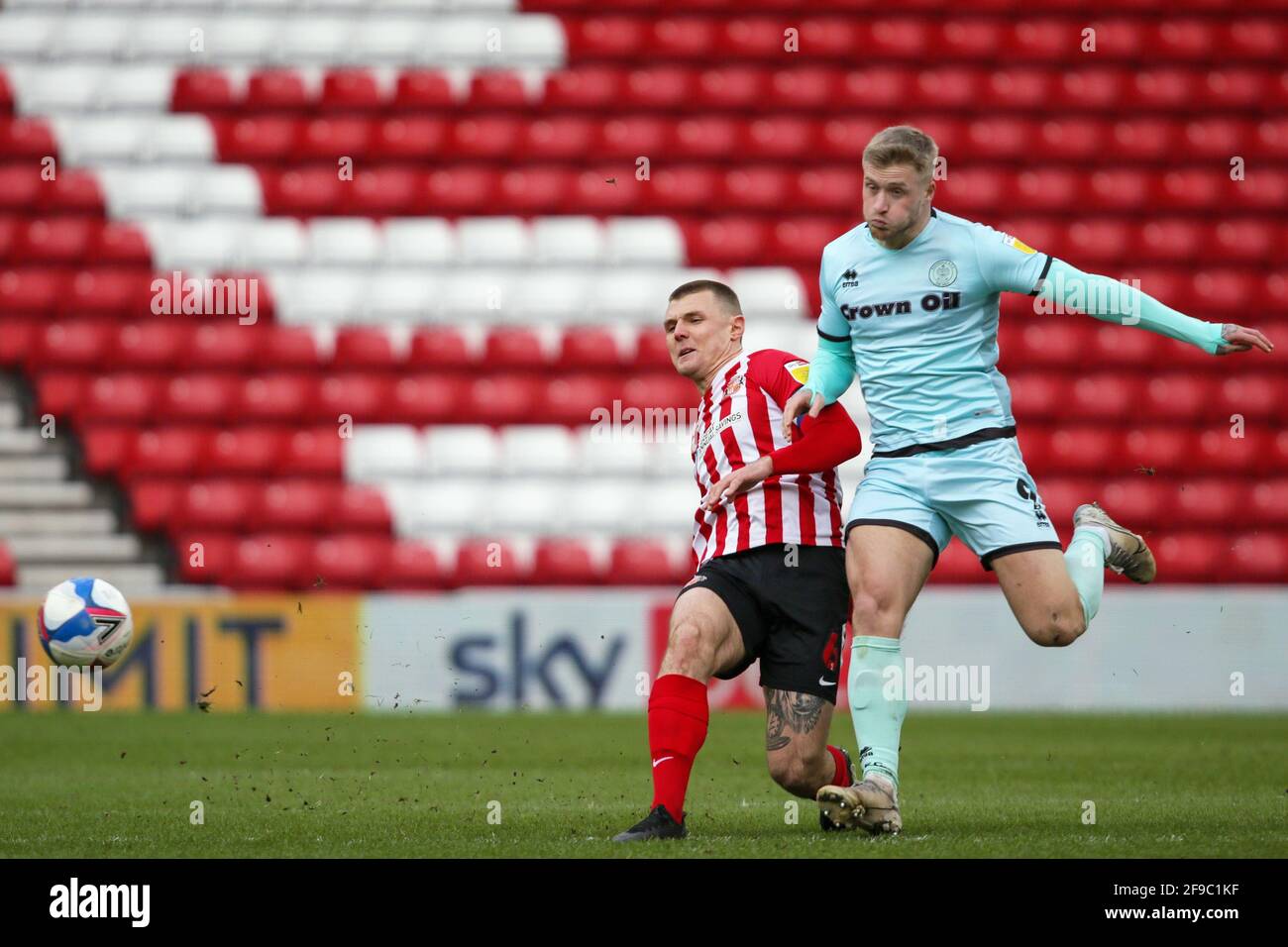 Stephen Humphrys of Rochdale tackles Max Power of Sunderland ...