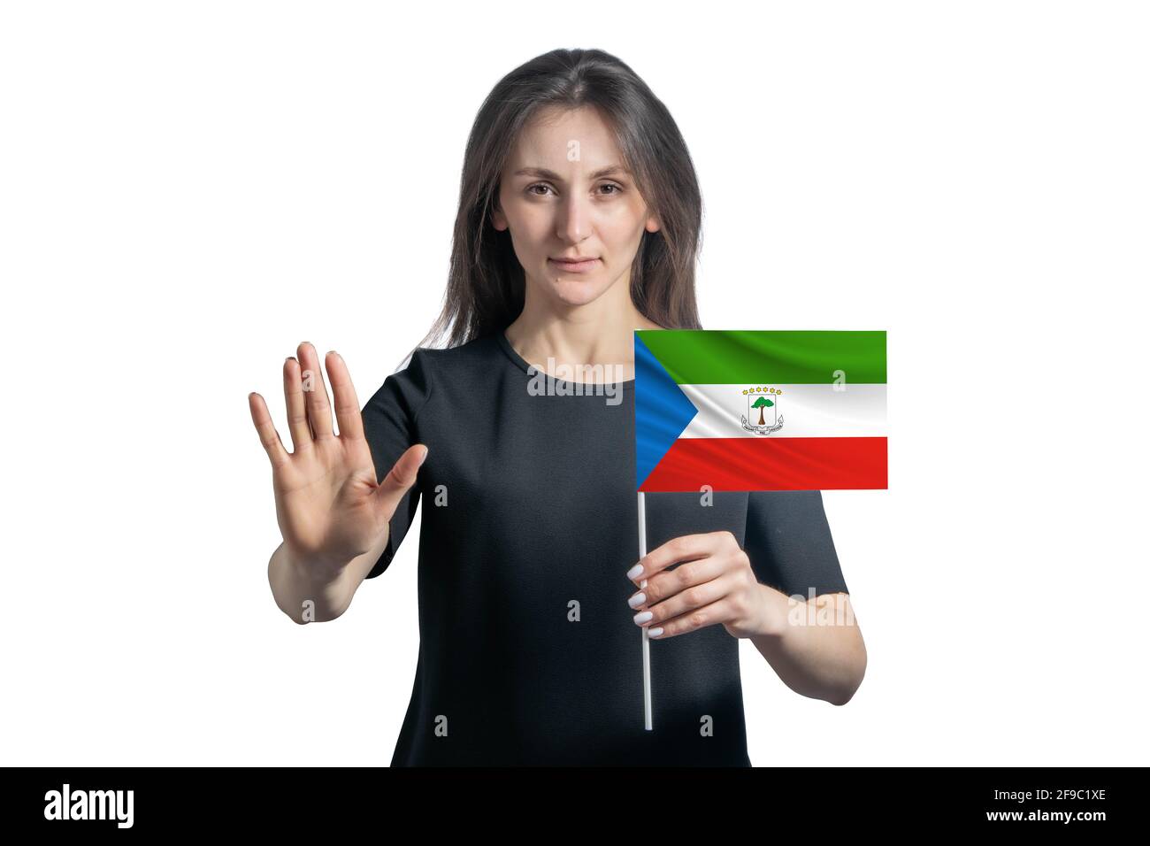 Happy young white woman holding flag of Equatorial Guinea and with a ...