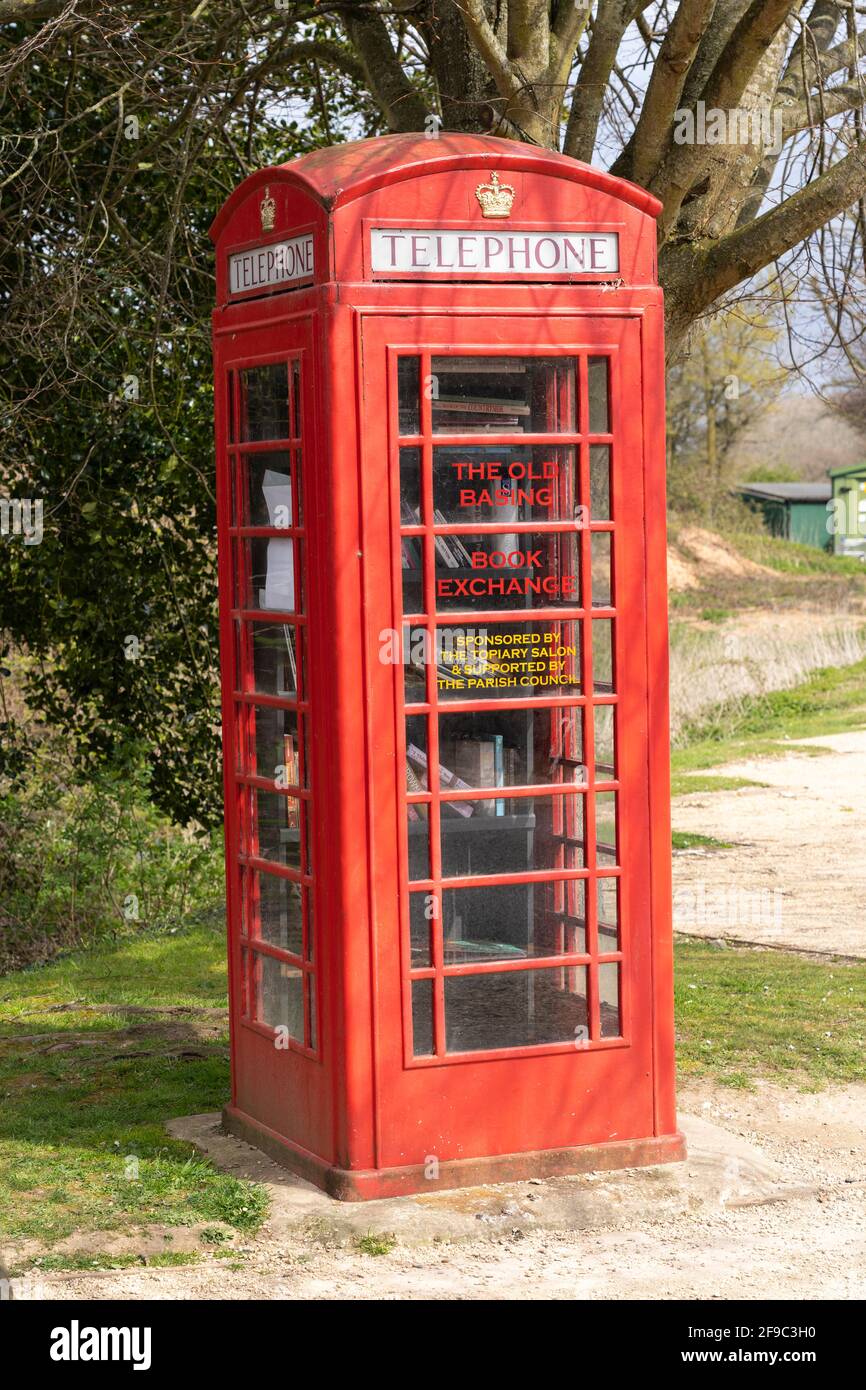 A repurposed iconic red telephone box used as a library - the Old ...