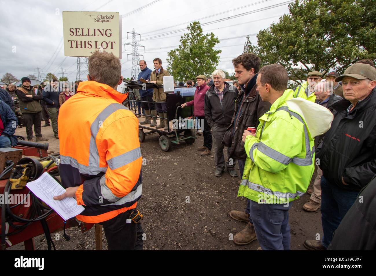 Farmers gathered at a farm machinery auction in rural Suffolk UK Stock ...