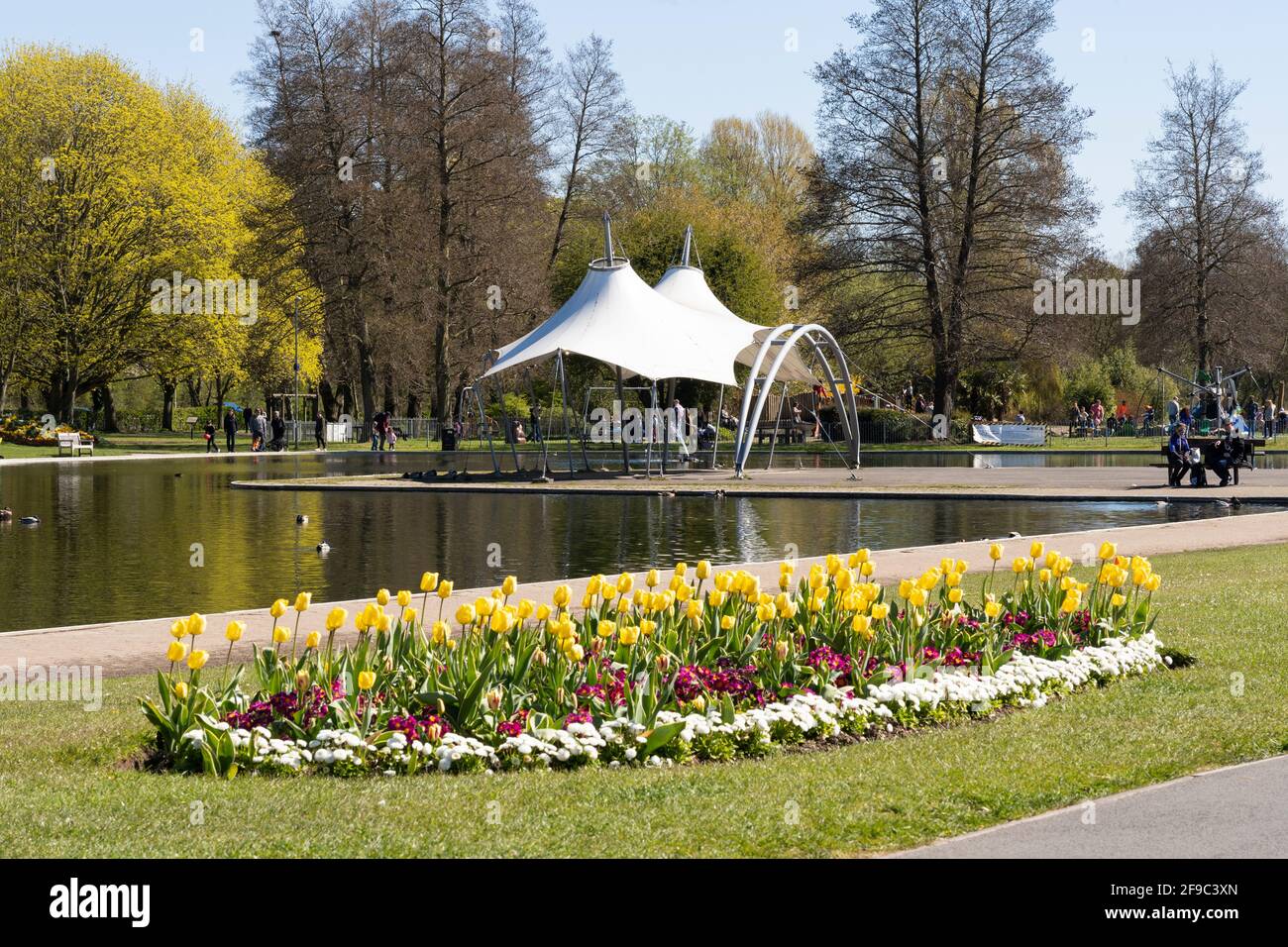 The covered bandstand and boating lake in Eastrop Park with spring ...