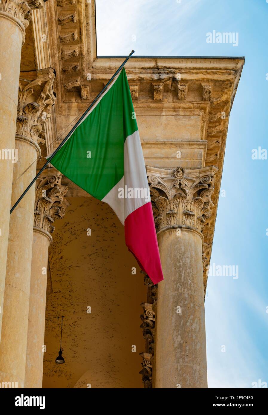 A picture of the Italian flag as seen in the facade of Verona's city ...