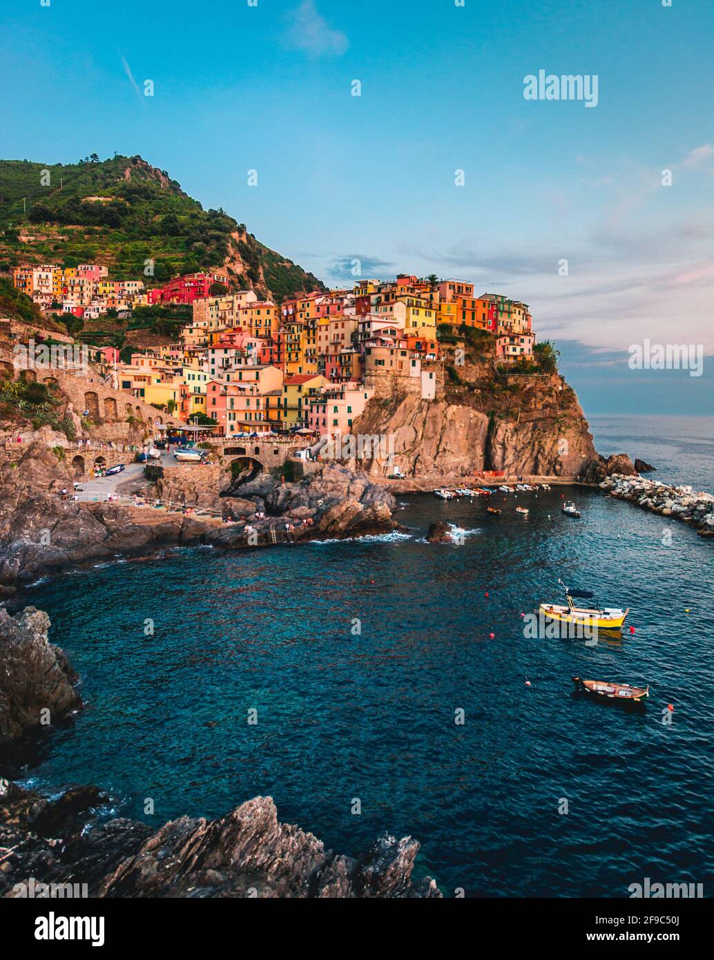 Manarola village on cliff rocks and sea at sunset., Seascape in Five ...