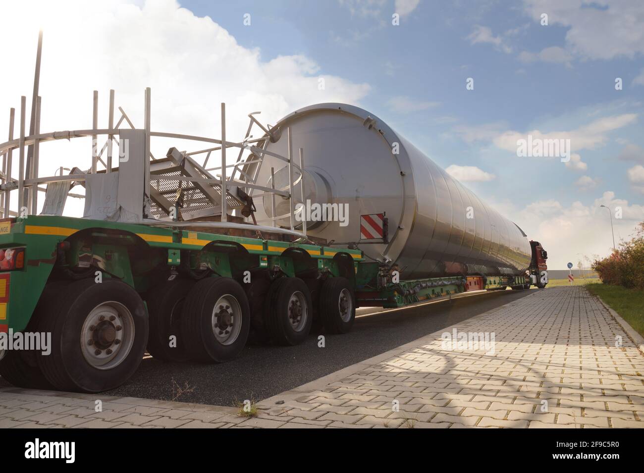 A truck with a special semi-trailer for transporting oversized loads. Oversize load, long load ...