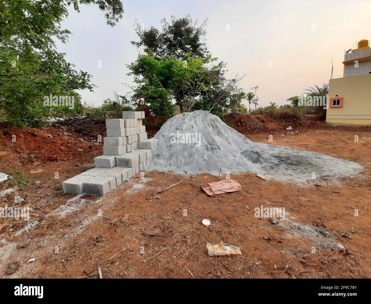 Construction of a new building with cement block and artificial sand at ...