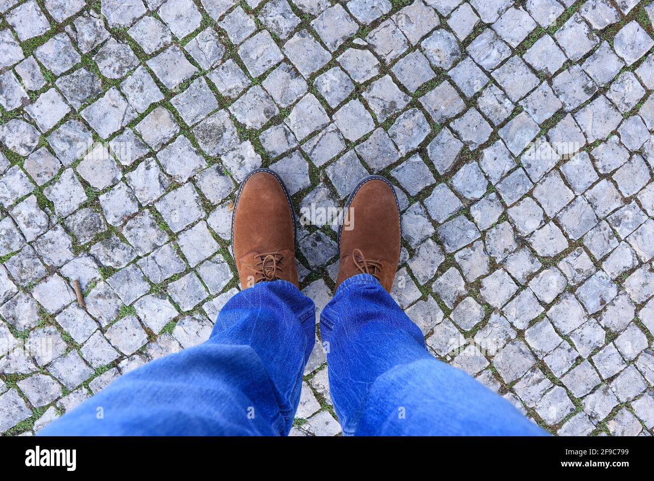Top view from man with brown leather shoes and jeans Stock Photo - Alamy