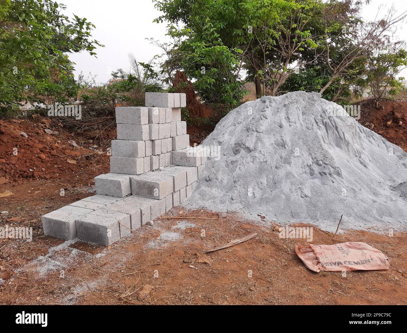 Construction of a new house with cement block and m sand at an empty ...