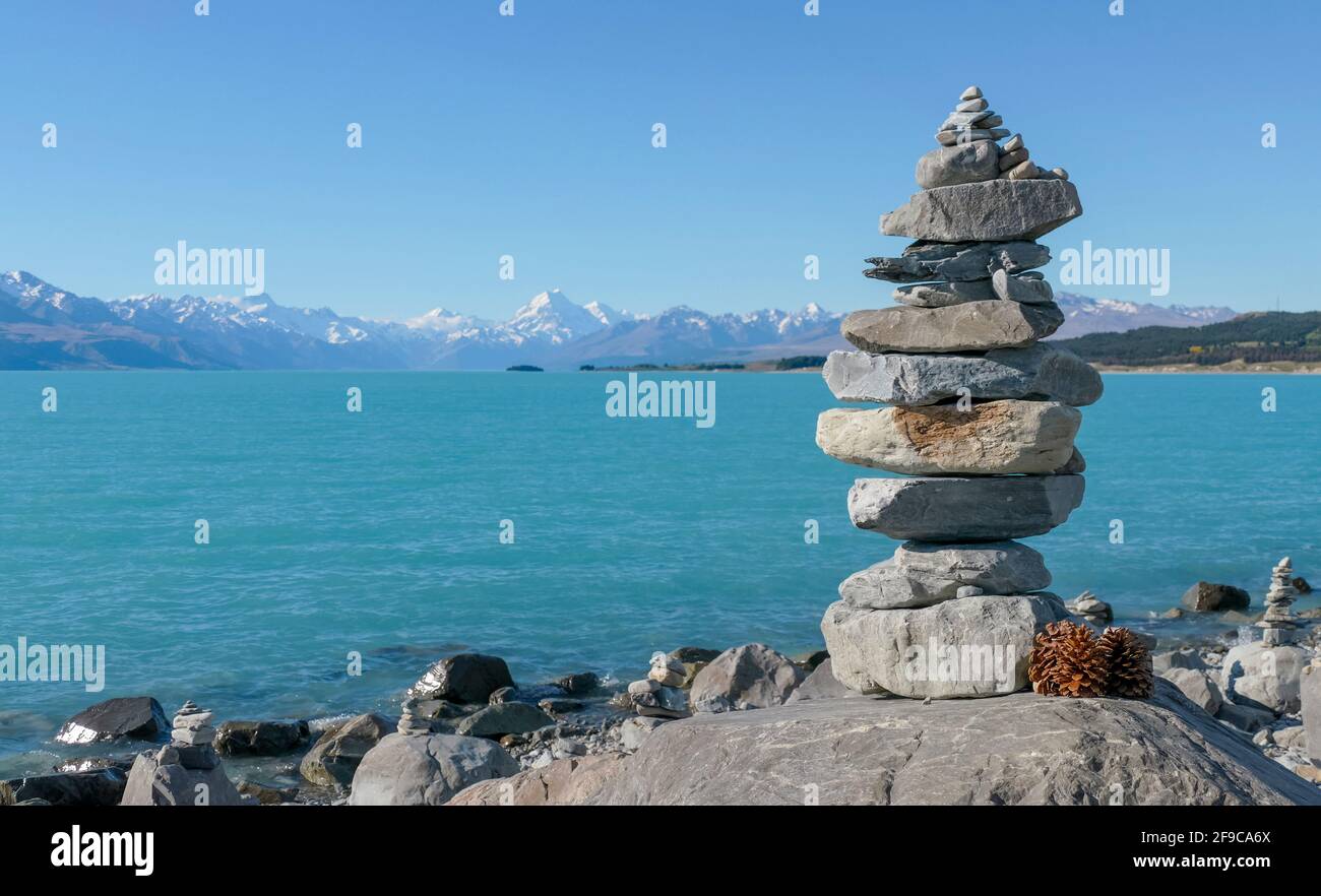 Stacked stones seen around Lake Pukaki at the South Island of New ...