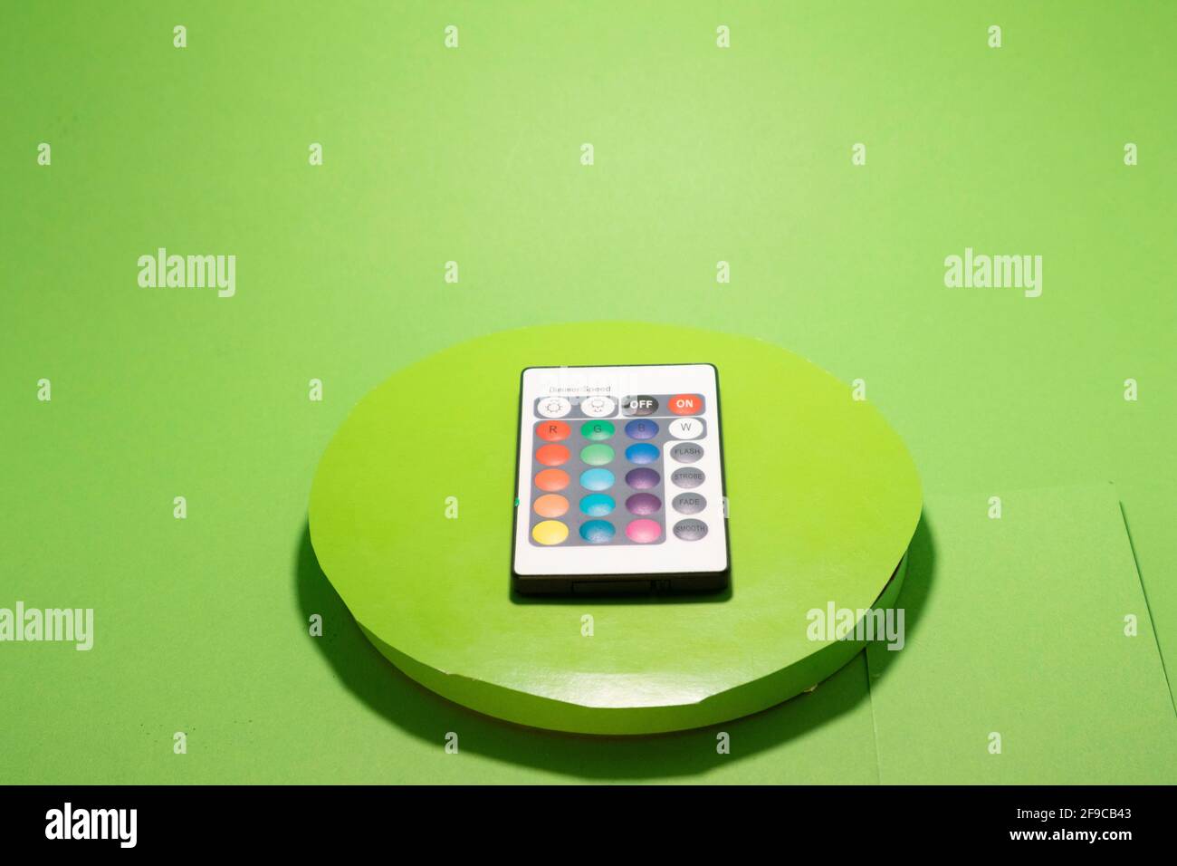 Remote to control modes lighting isolated chroma key Stock Photo - Alamy