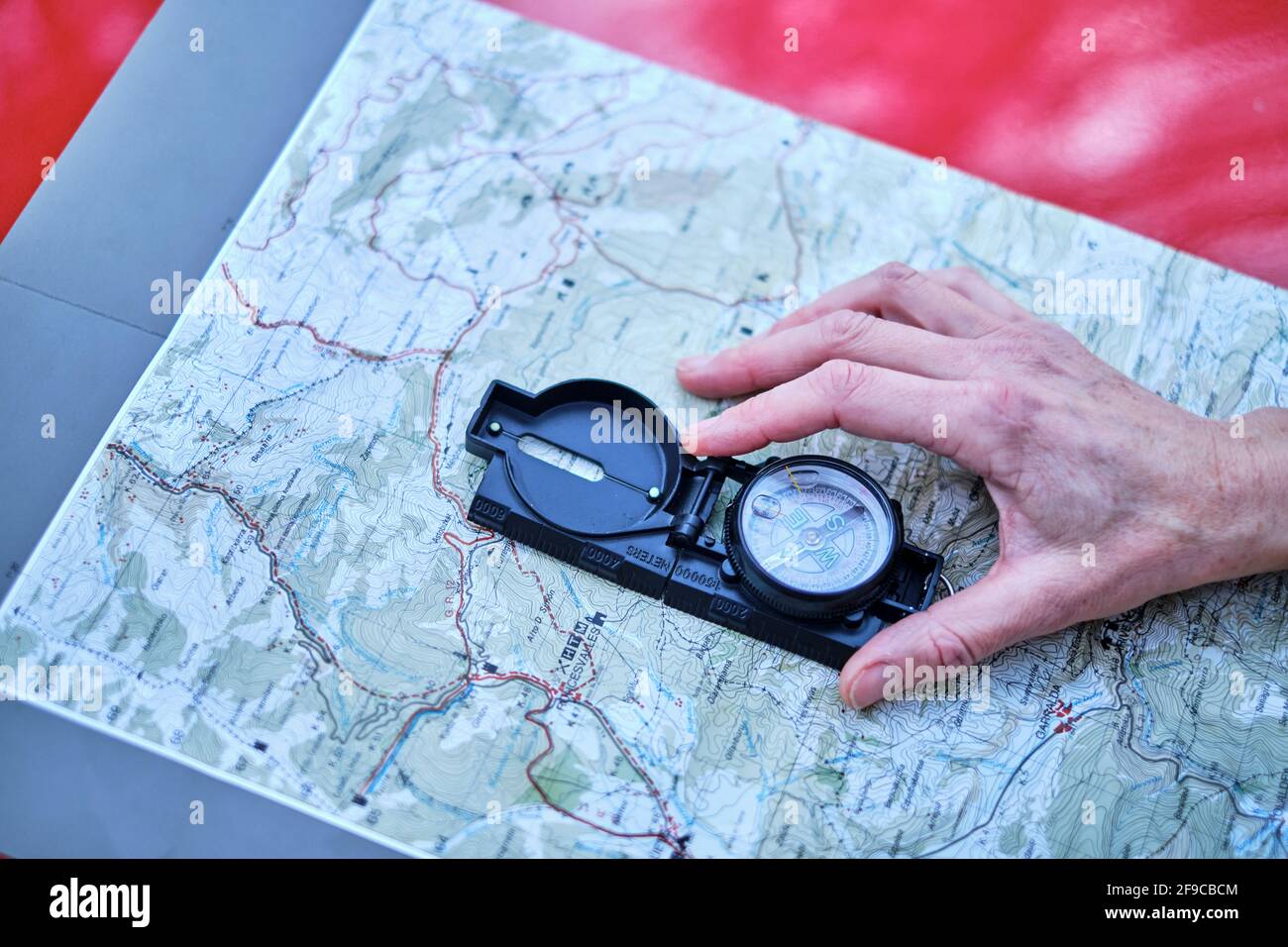 Woman map compass hi-res stock photography and images - Alamy