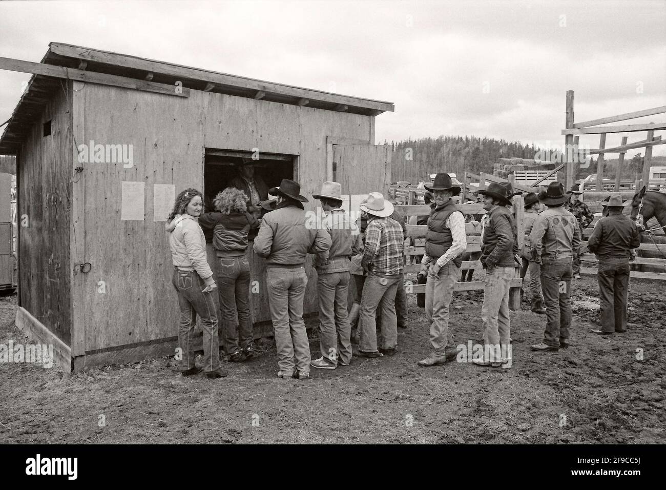 Cowboy and Cowgirl contestants lined up at the rodeo office in Water ...