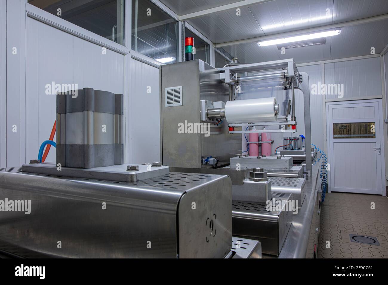 Processing of Packaging of butter and Cheese on food vacuum packaging ...