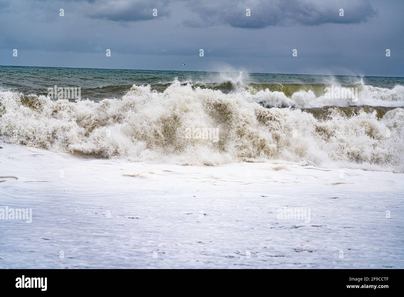 storm clouds over sea water dramatic sky and giant waves Stock Photo ...