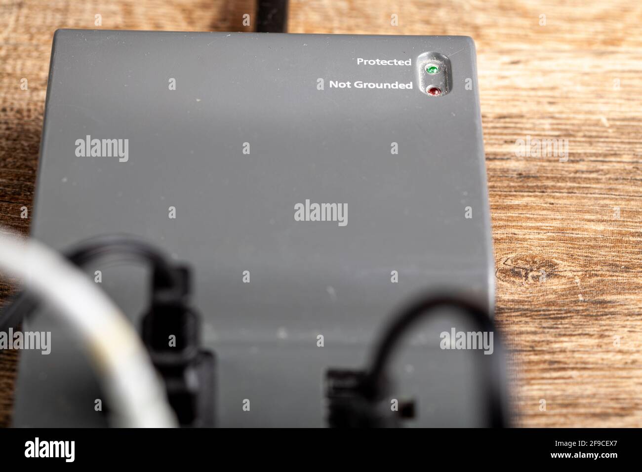 Close up top view imge of a corded power strip with surge protection ...